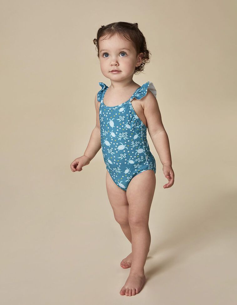 Hellblauer Badeanzug mit Schildkrötenmotiv für Baby-Mädchen | Gocco